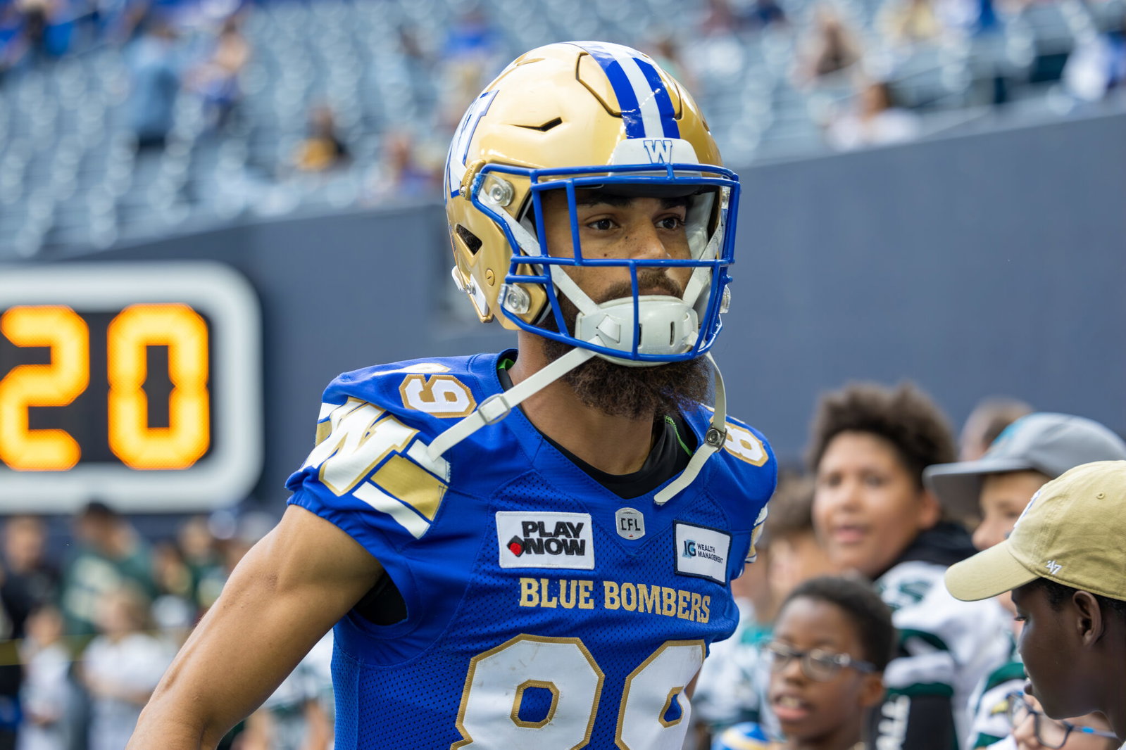 Bombers' all-star receiver Kenny Lawler exits CFL season opener with ...